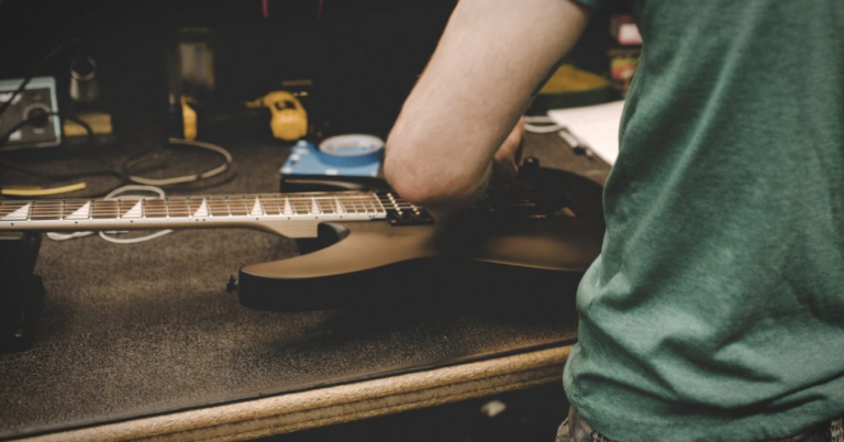 How To Put On a Guitar Strap: Tuning and Attachment - Zager Guitar Blog