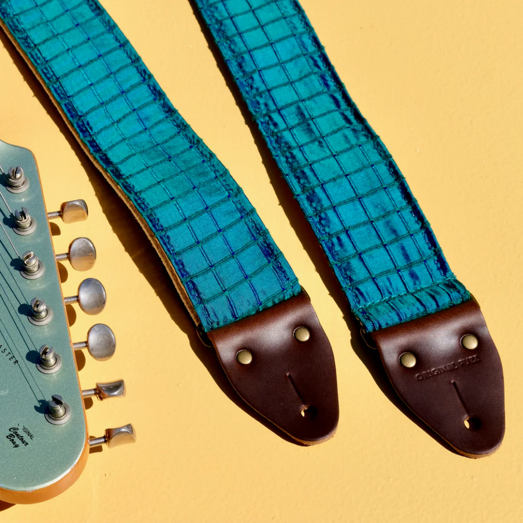How To Put On a Guitar Strap: Tuning and Attachment - Zager Guitar Blog