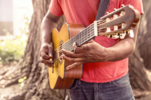 How To Put On a Guitar Strap: Tuning and Attachment - Zager Guitar Blog