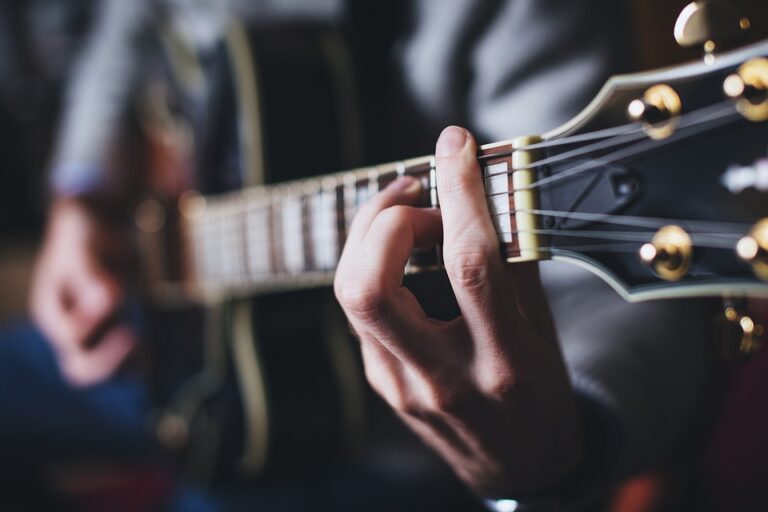 How To Put a Strap on a Guitar - Zager Guitar Blog